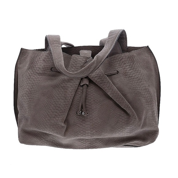 H by Halston | Bags | H By Halston Logo Leather Drawstring Handbag ...